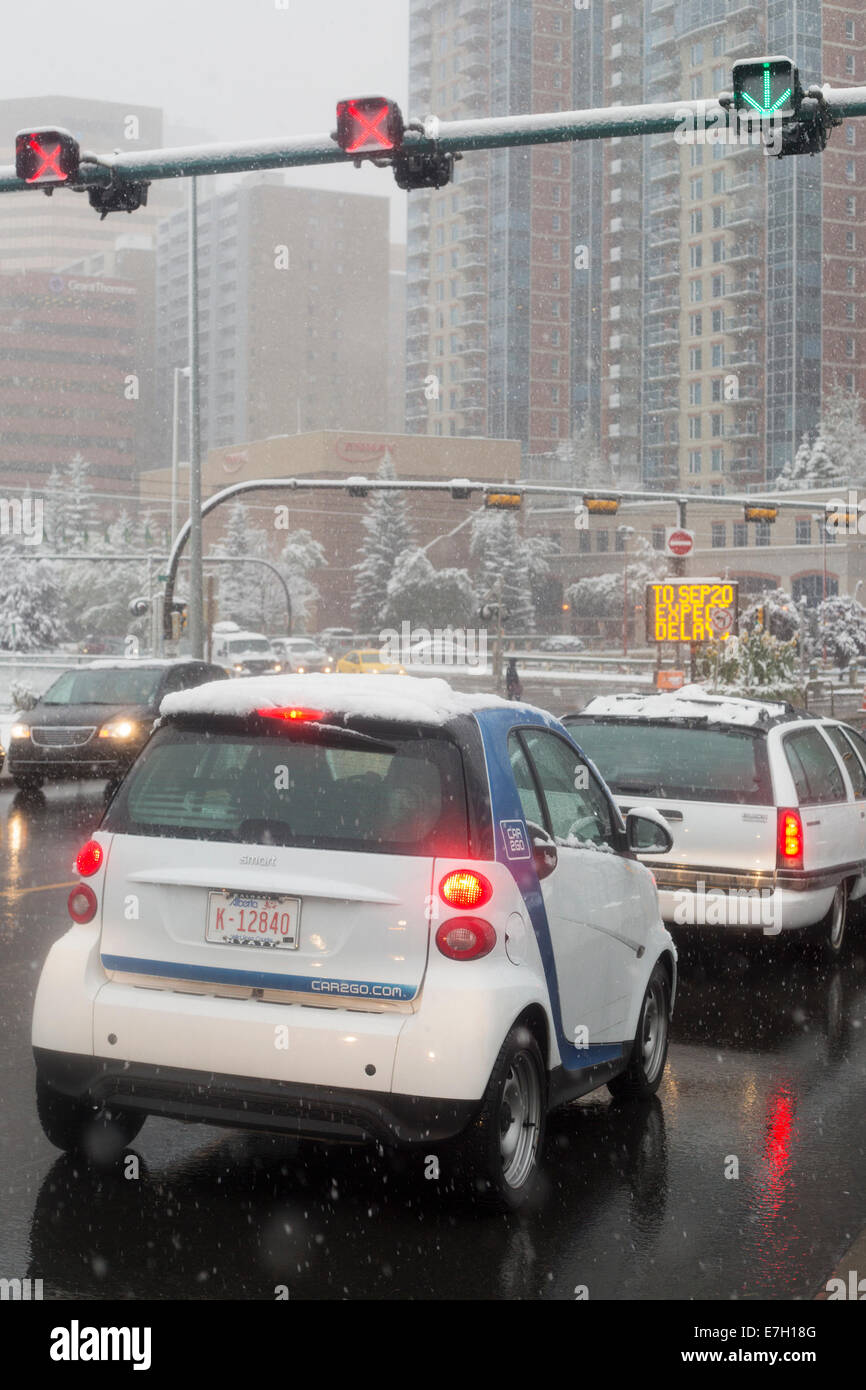 Car2Go shared vehicle on road with a lane reversal system at rush hour ...