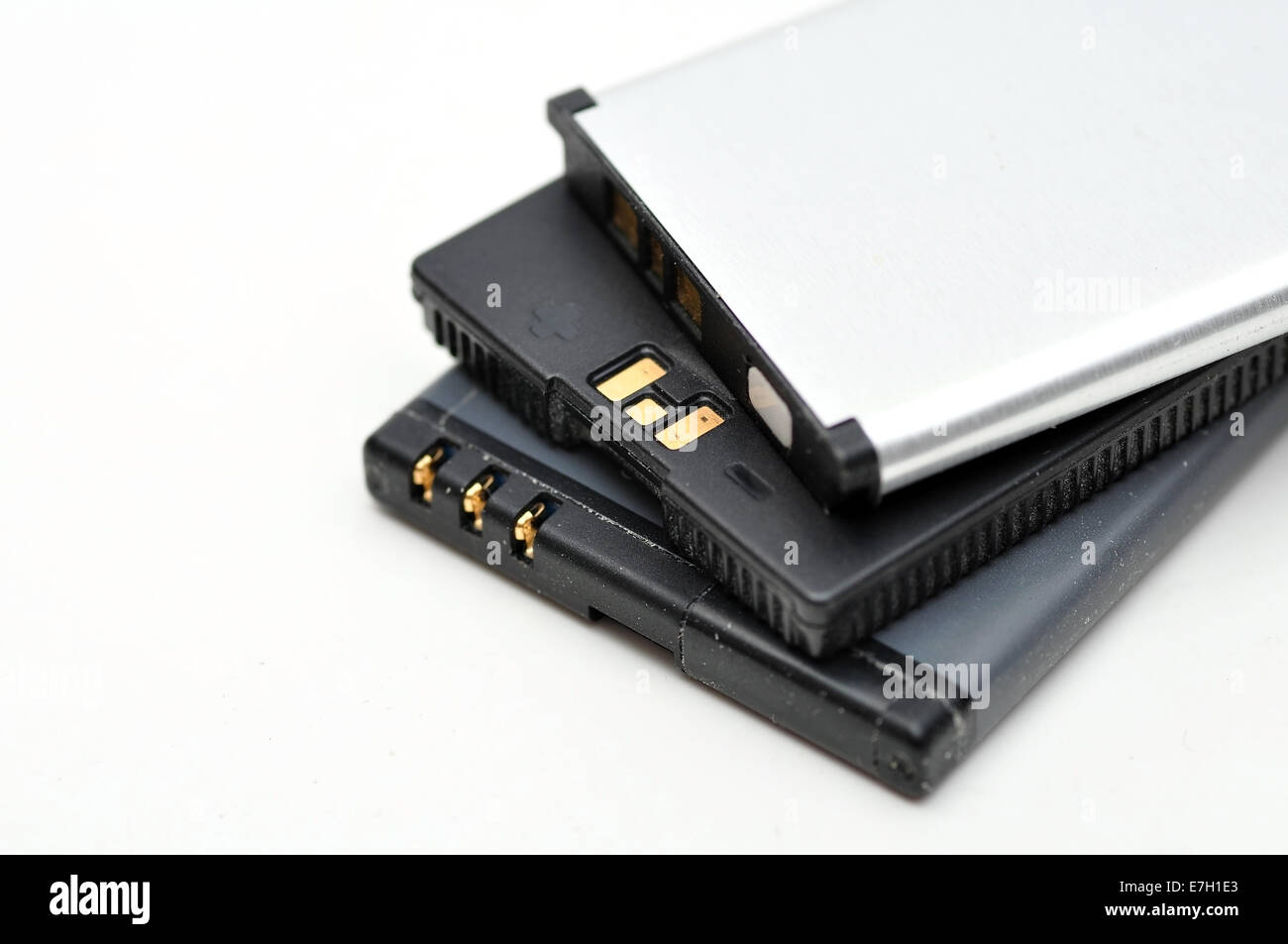 Batteries, old cellphone batteries Stock Photo - Alamy