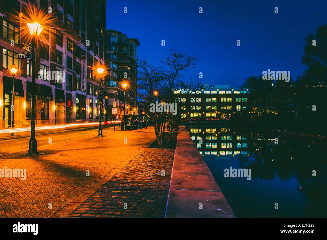 Canal along a street at night in Baltimore, Maryland Stock Photo - Alamy