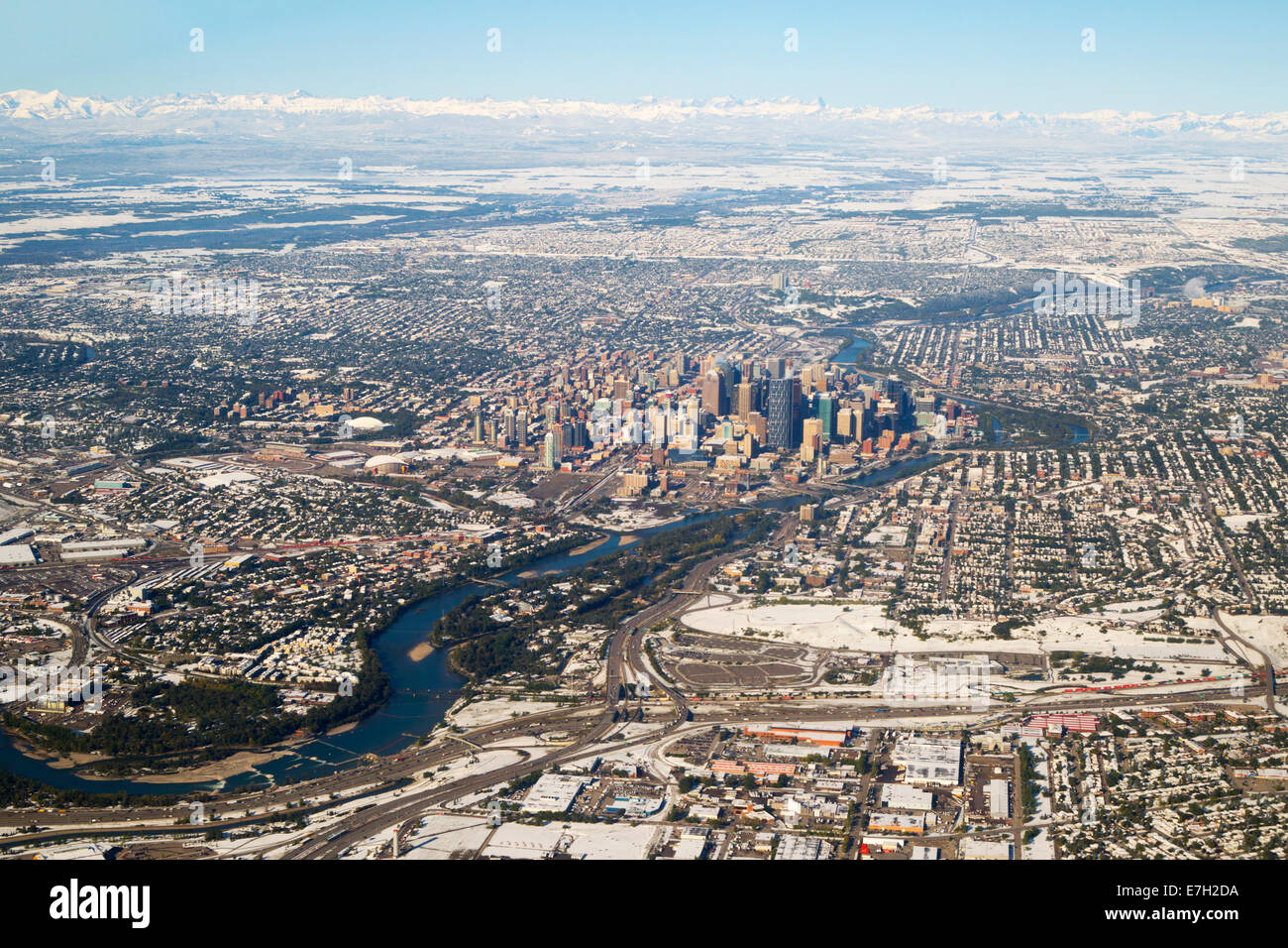 Aerial view of Calgary and the Bow River looking west toward the Rocky ...