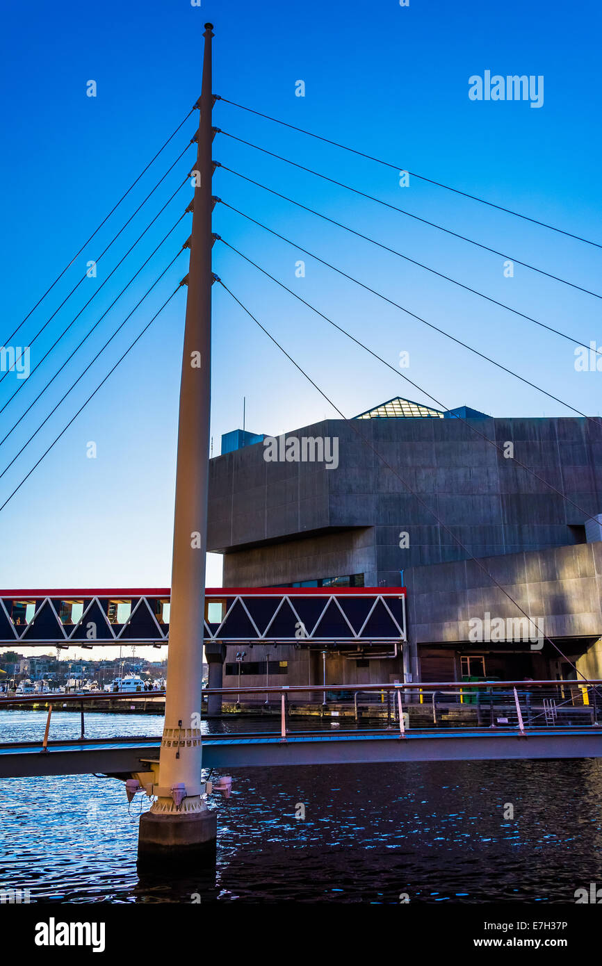 Walking bridge and the National Aquarium in the Inner Harbor of ...