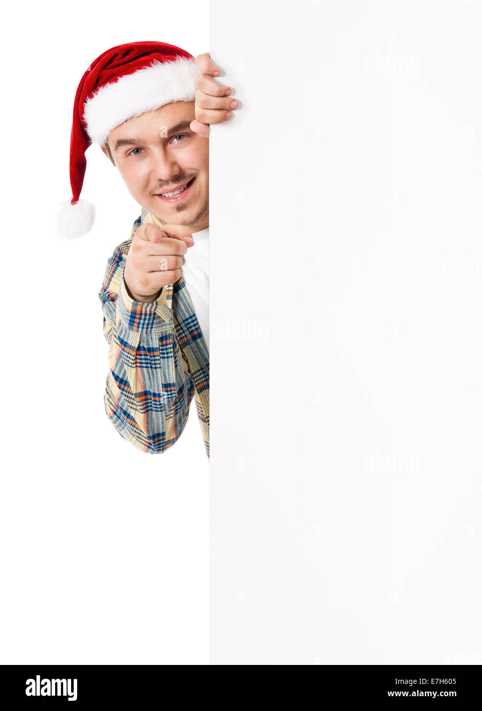 Young man in Santa hat Stock Photo - Alamy