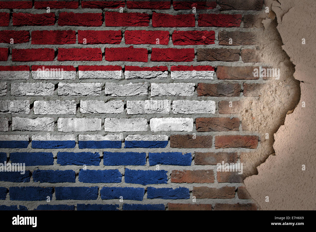 Dark brick wall texture with plaster - flag painted on wall ...