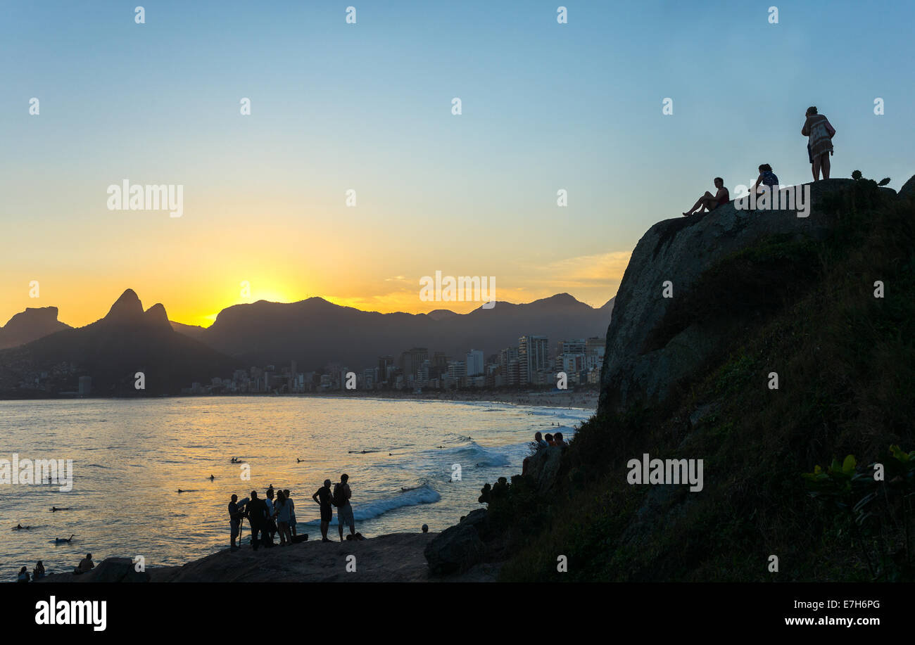 Brazil, Rio De Janeiro, people on the Pedra do Arpoador promontory at ...