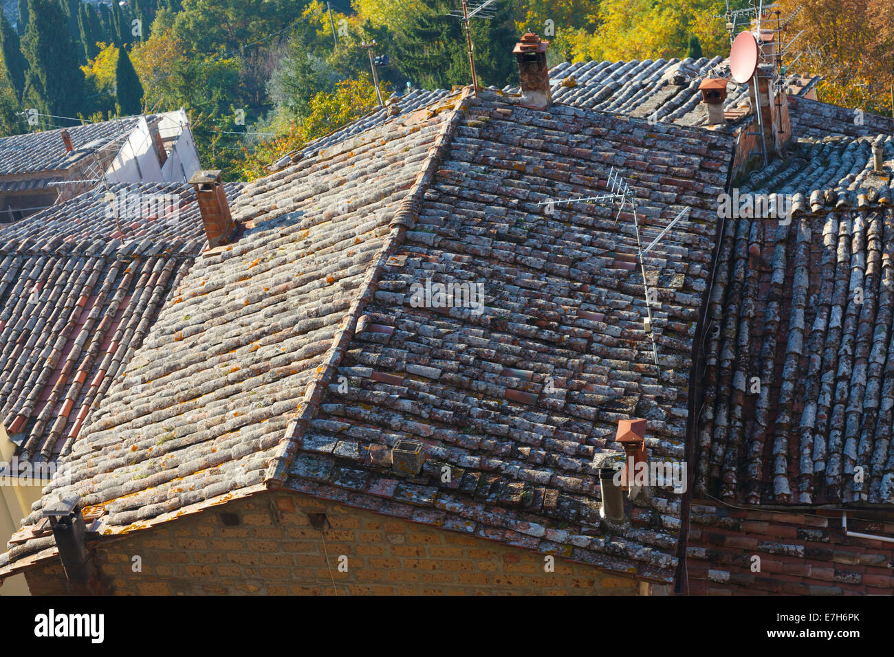 Close up of the traditional Italian red roof tiles in a small village ...