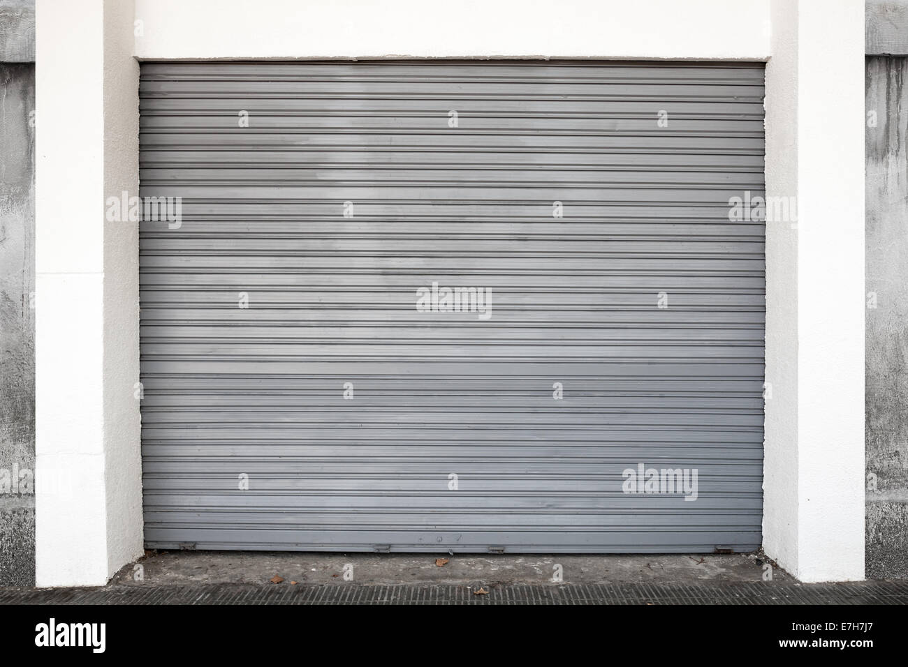 Gray metal garage gate, background photo texture Stock Photo - Alamy