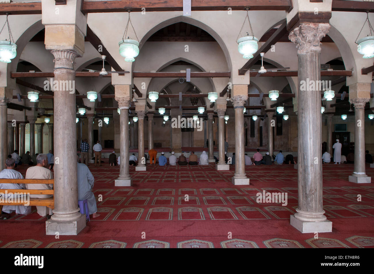 Muslims worshipers praying at the Hypostyle prayer hall with columns ...