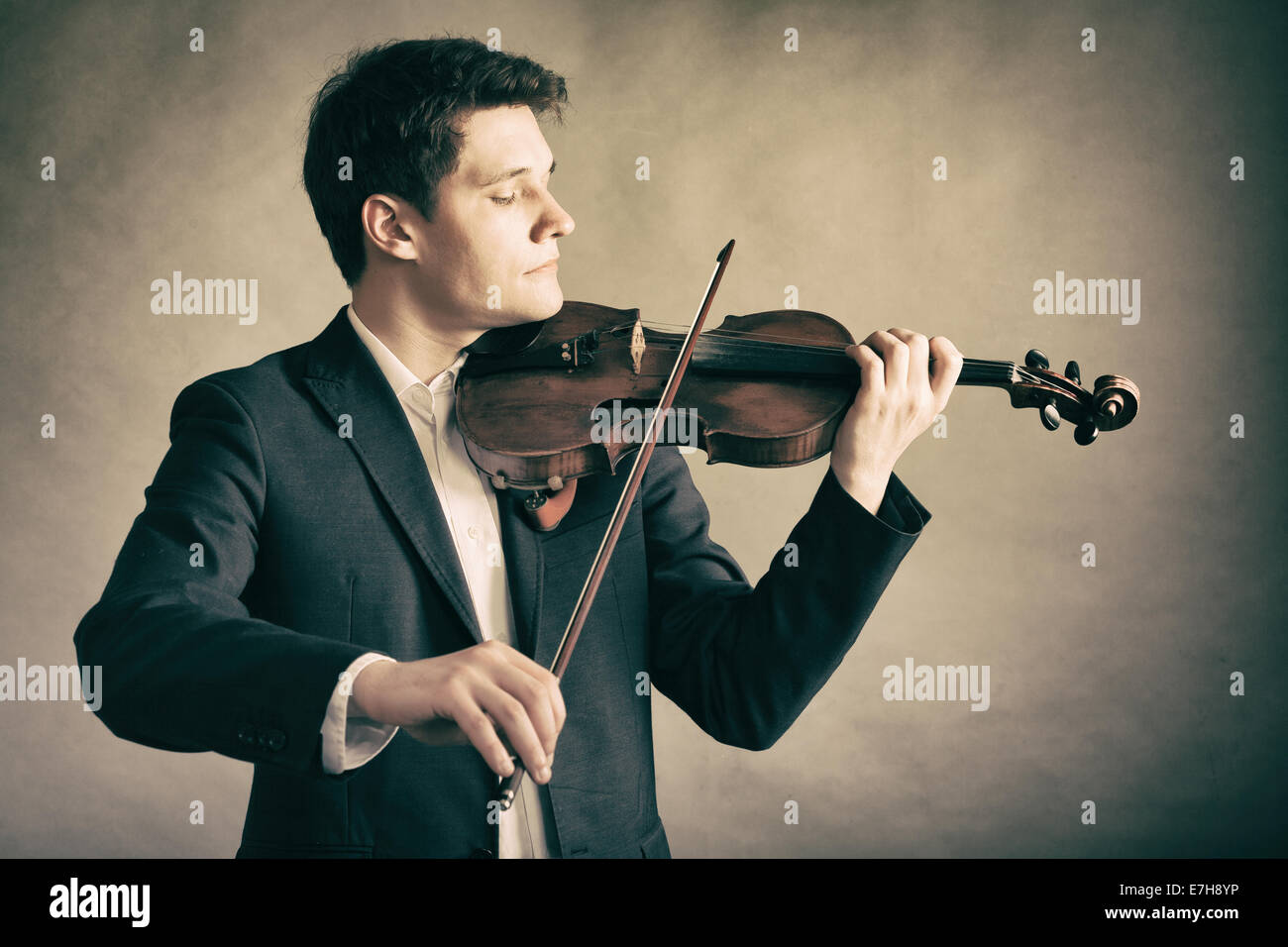 Man violinist playing violin. Classical music art Stock Photo - Alamy