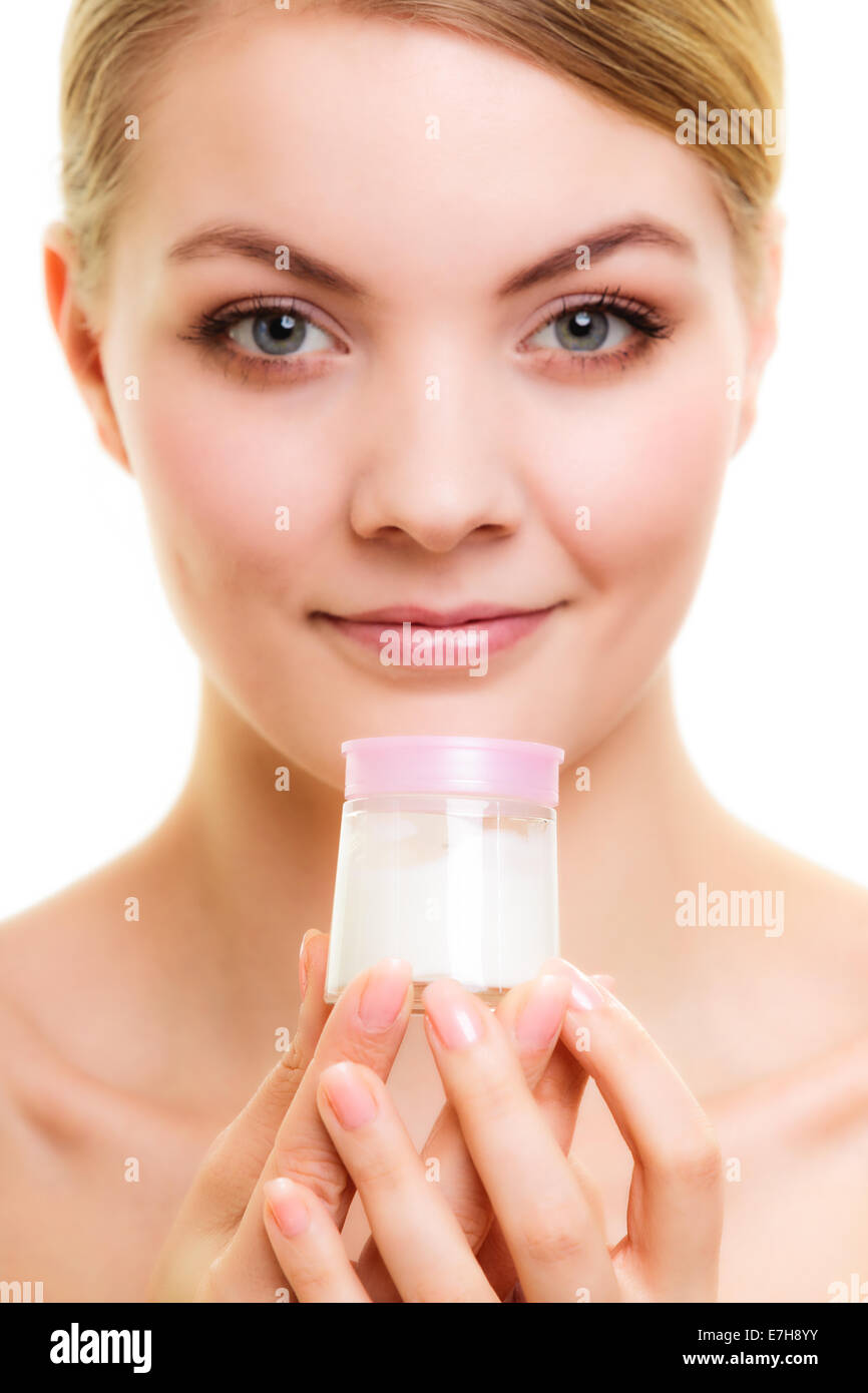 Skincare. Young woman girl taking care of her dry complexion applying ...