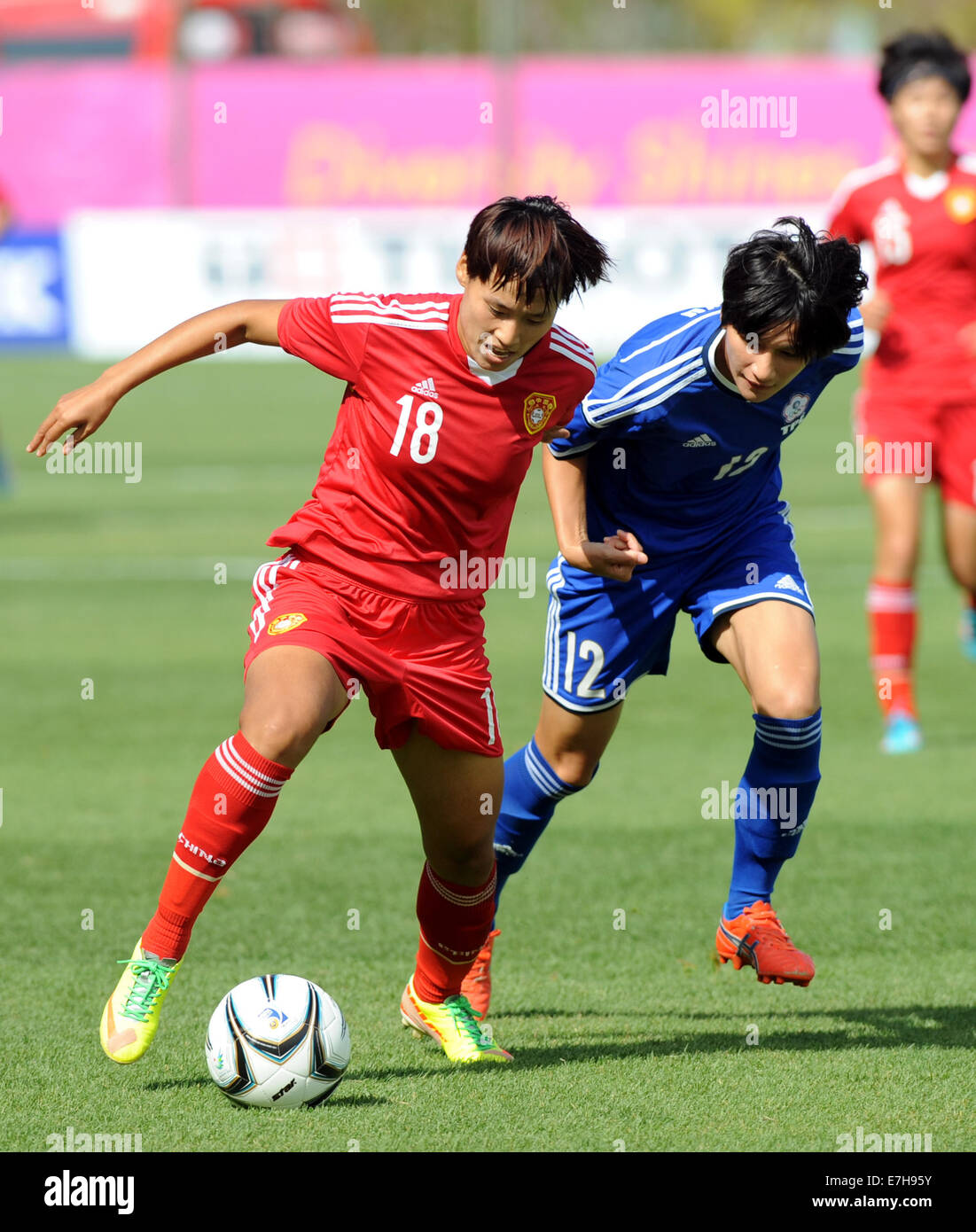 Incheon, South Korea. 18th Sep, 2014. Han Peng of China (L) vies for ...