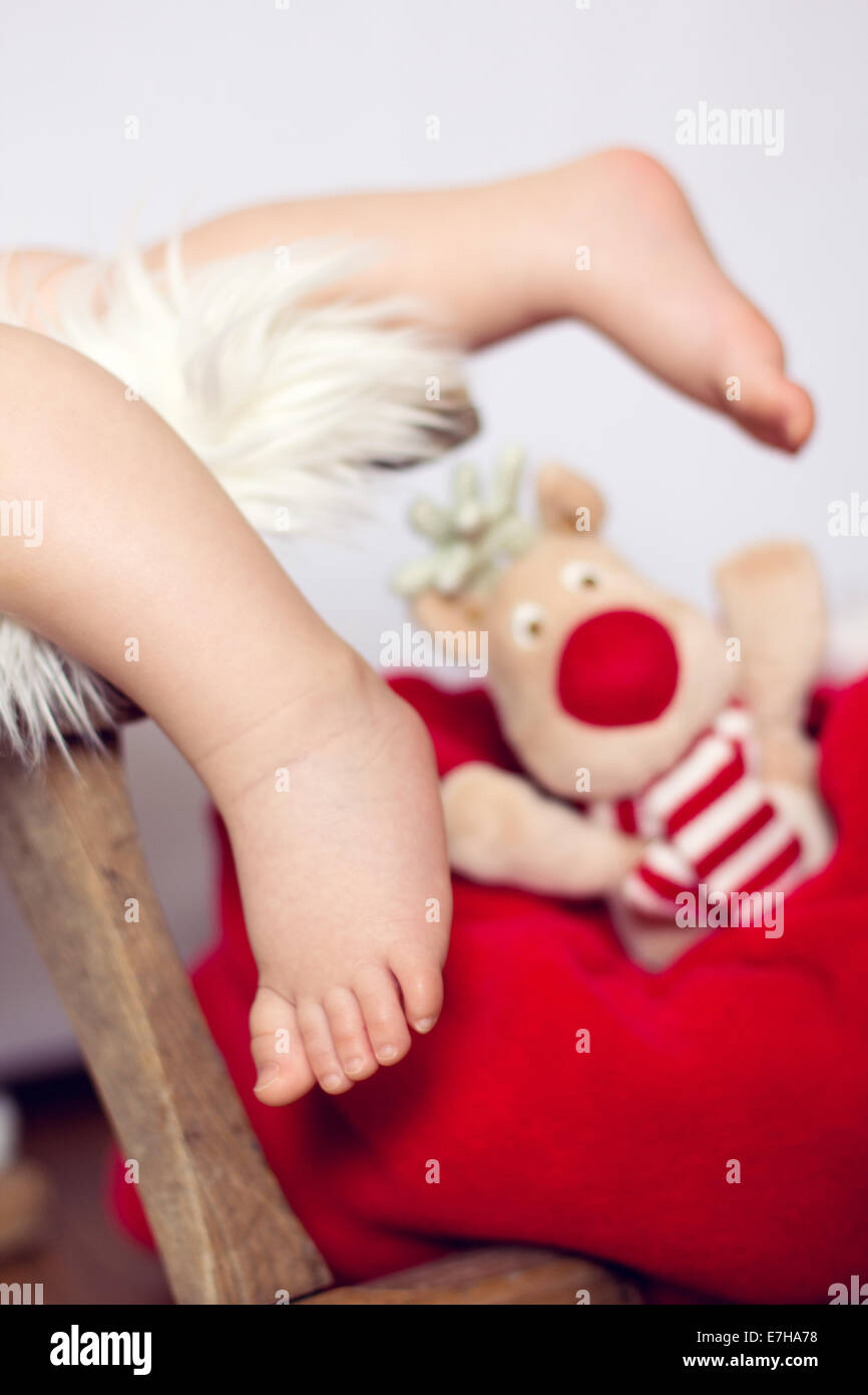 Little baby boy, sleeping on a sled Stock Photo - Alamy