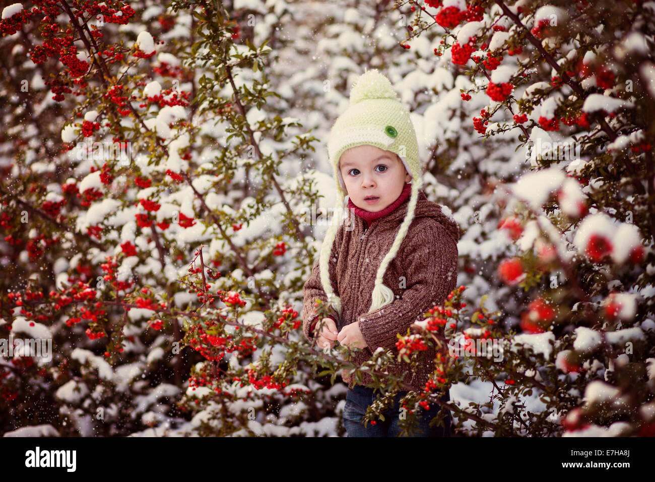 Boy outside in the snow Stock Photo - Alamy