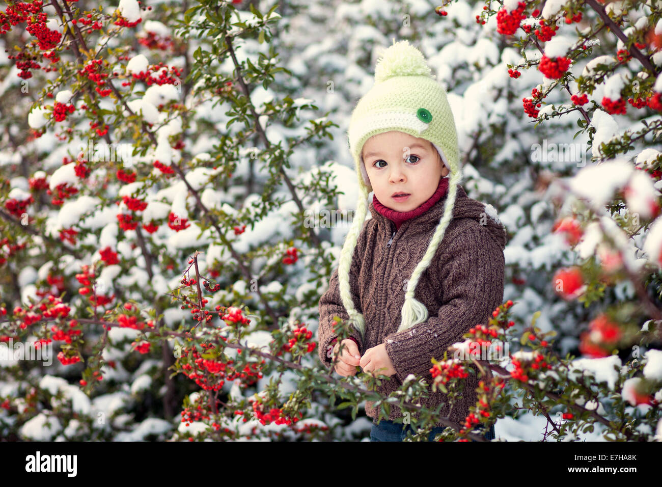 Boy outside in the snow Stock Photo - Alamy