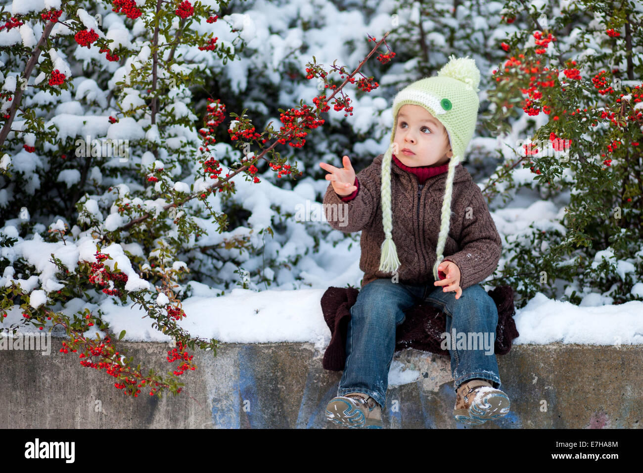 Boy outside in the snow Stock Photo - Alamy