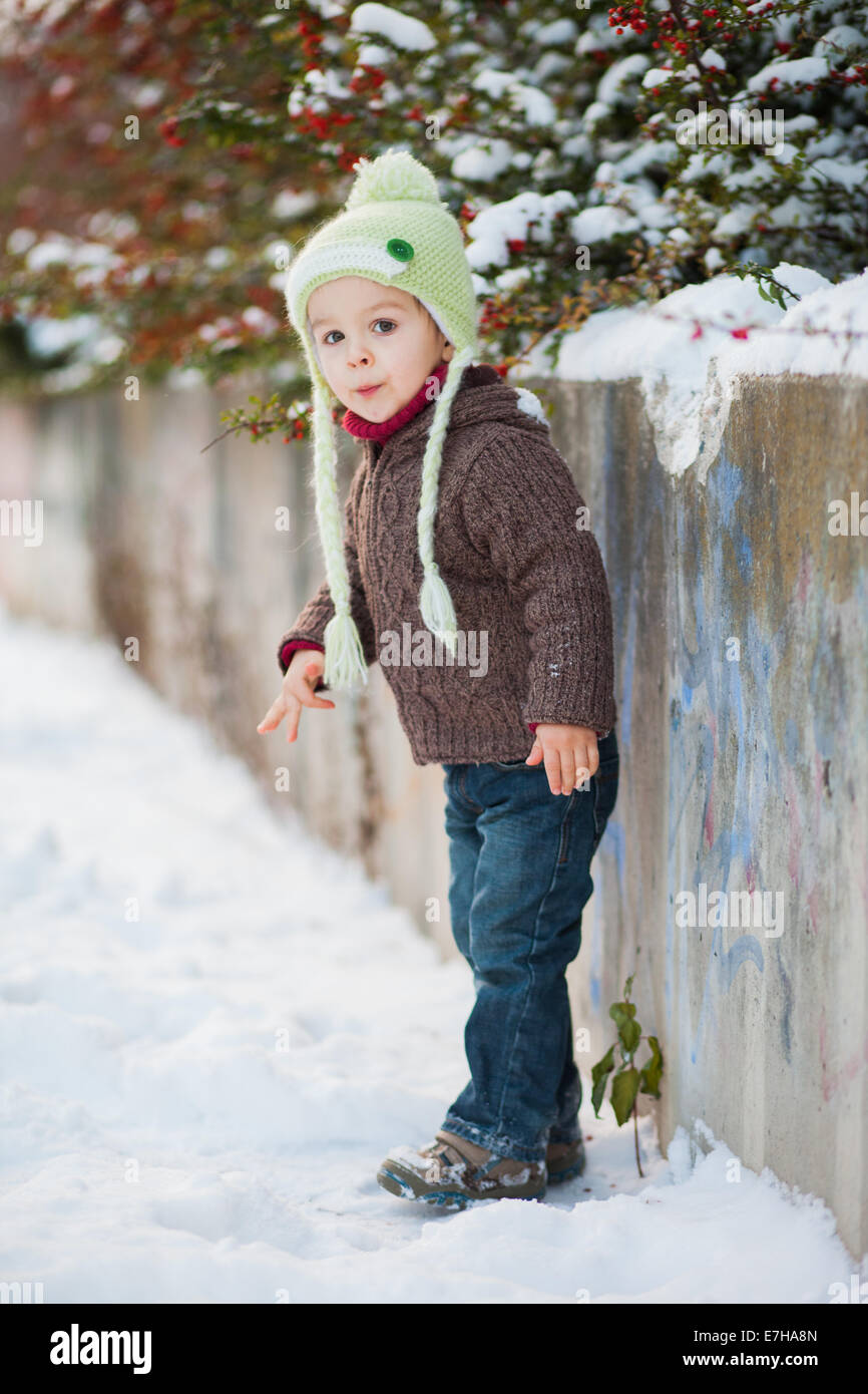 Boy outside in the snow Stock Photo - Alamy