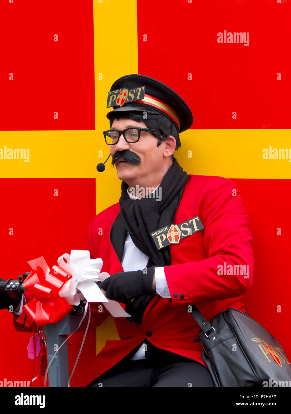 DORDRECHT, THE NETHERLANDS - NOVEMBER 18: Man dressed as the postman of ...