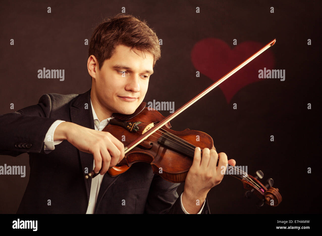 Man violinist playing violin. Classical music art Stock Photo - Alamy