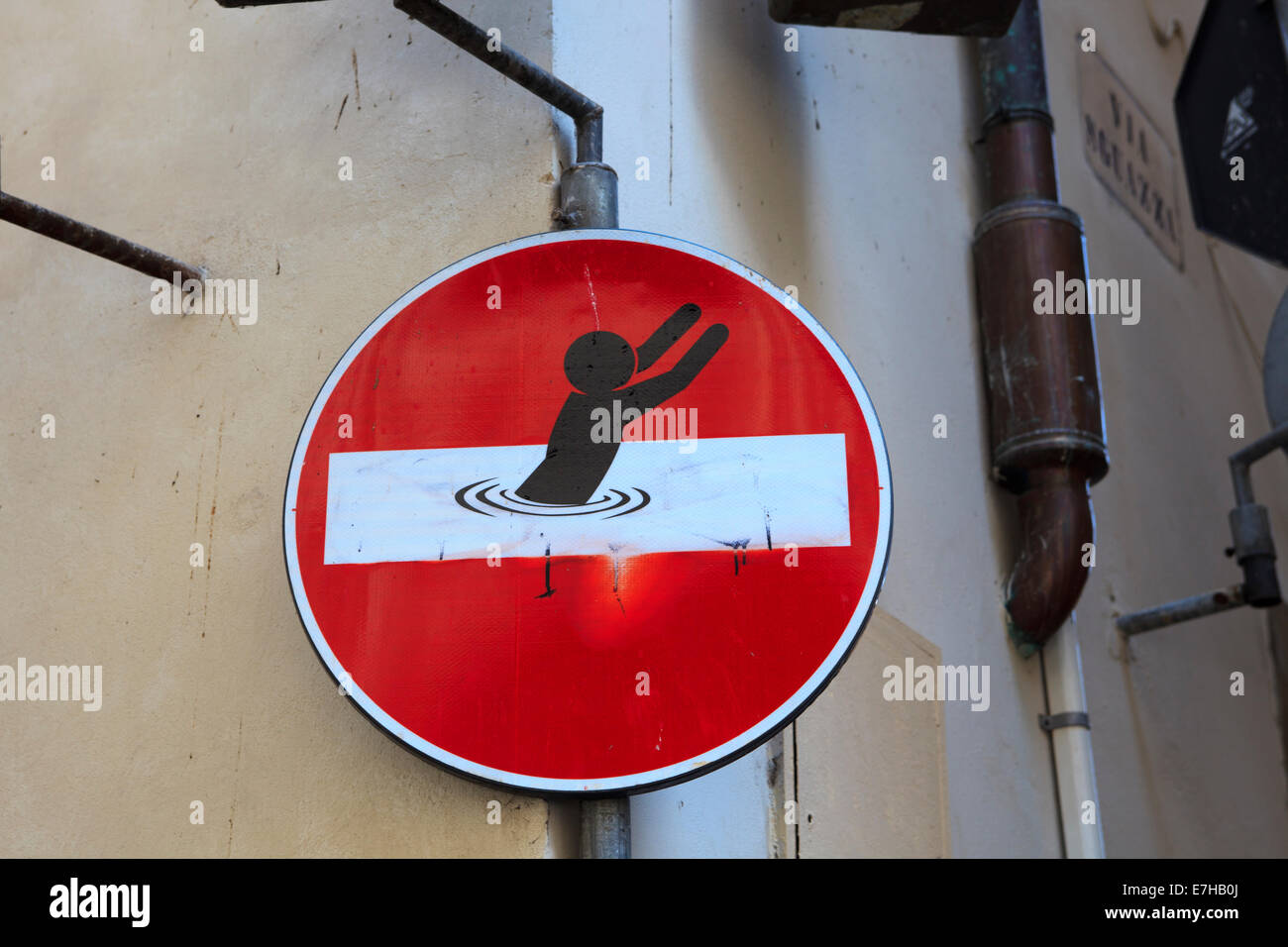 Road sign defaced by street artist Clet Abraham, Florence, Firenze ...