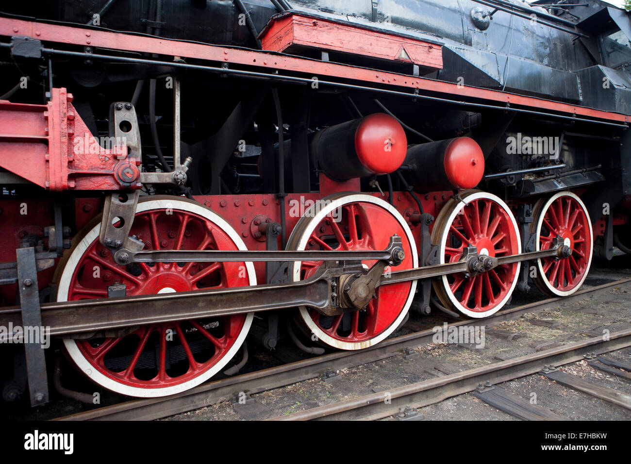 Red wheel on a steam train locomotive Stock Photo - Alamy