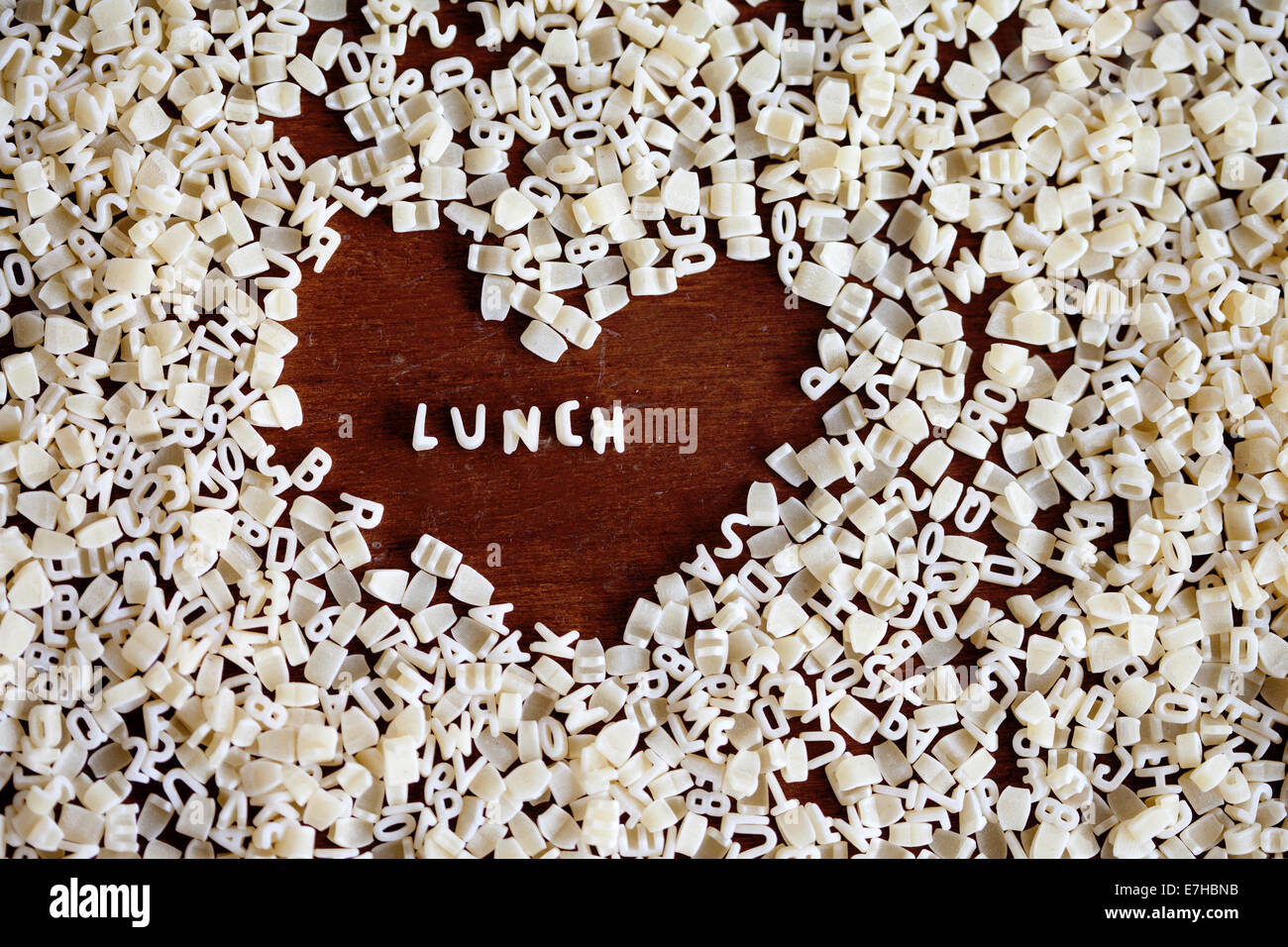 Lunch sign from pasta letters in a shape of heart Stock Photo - Alamy