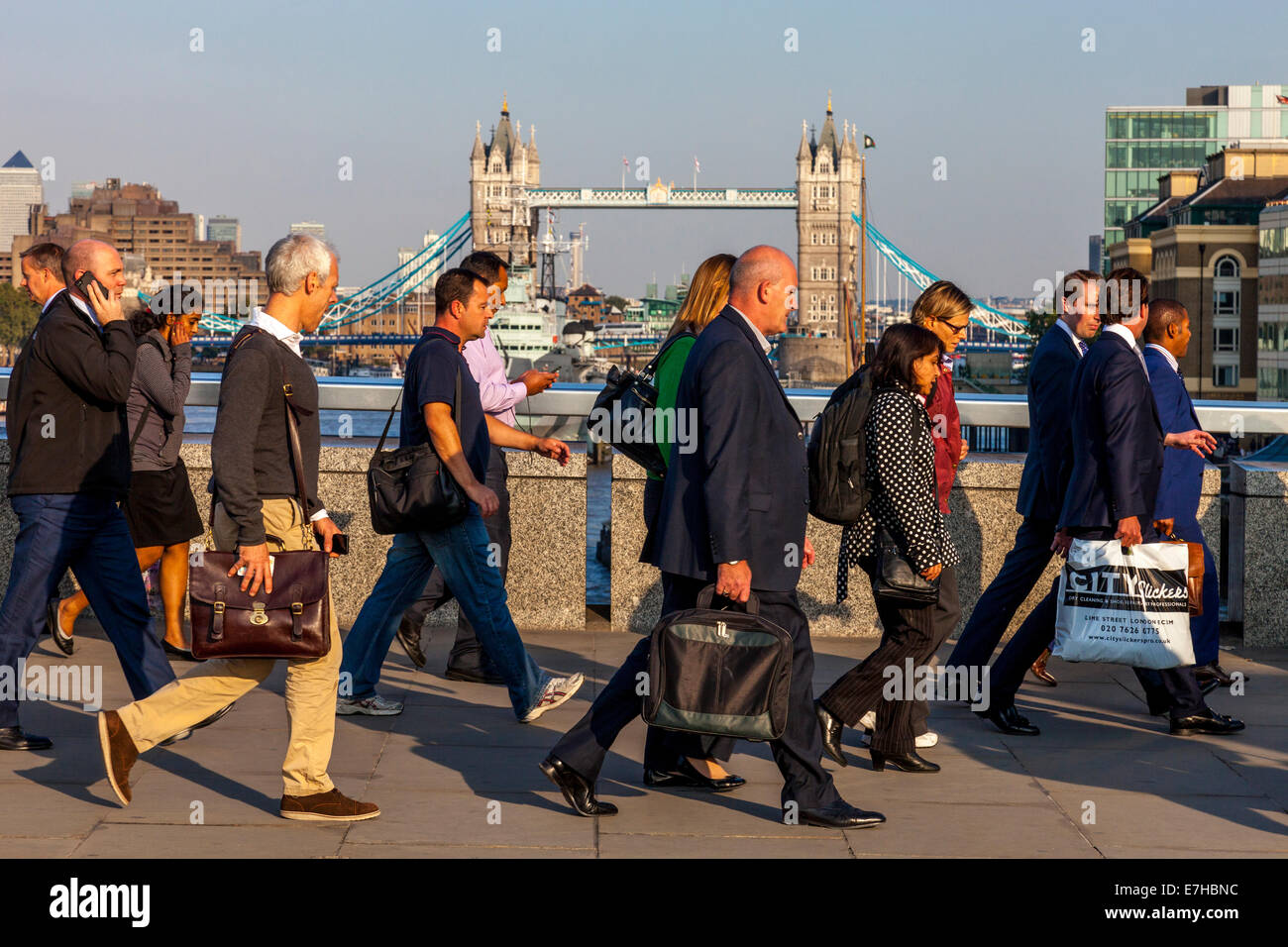 Workers walk across london bridge hi-res stock photography and images ...