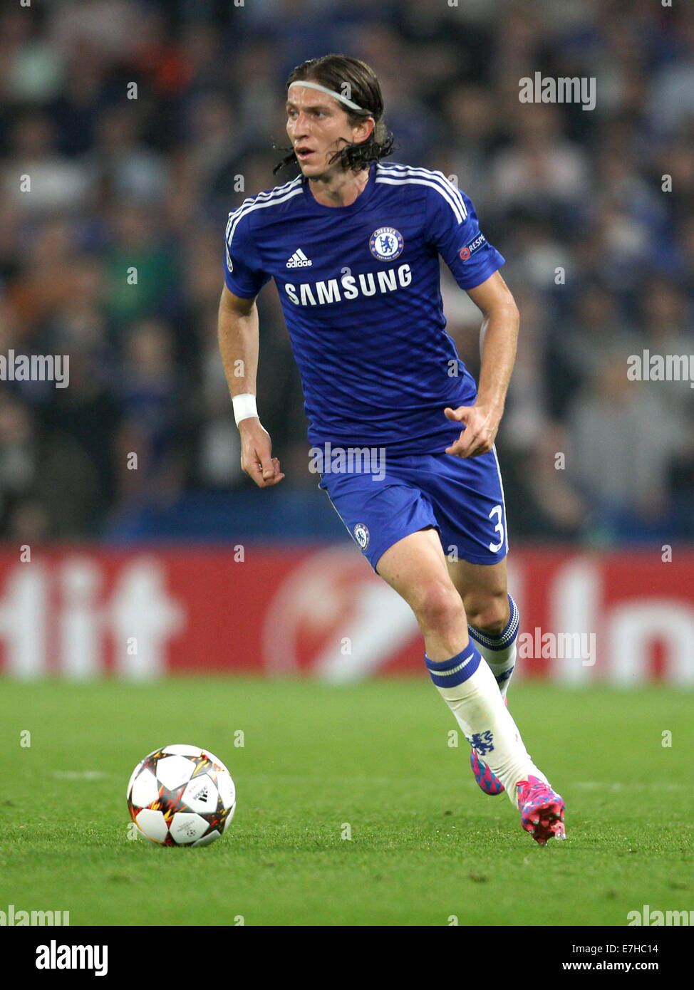 London, Britain. 17th Sep, 2014. Chelsea's Filipe Luis kicks a ball ...