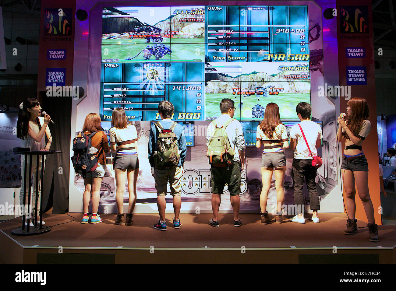 Visitors test the latest technology innovations in video game devices ...