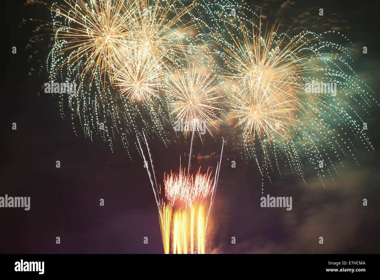 Red colorful fireworks on the black sky background Stock Photo - Alamy