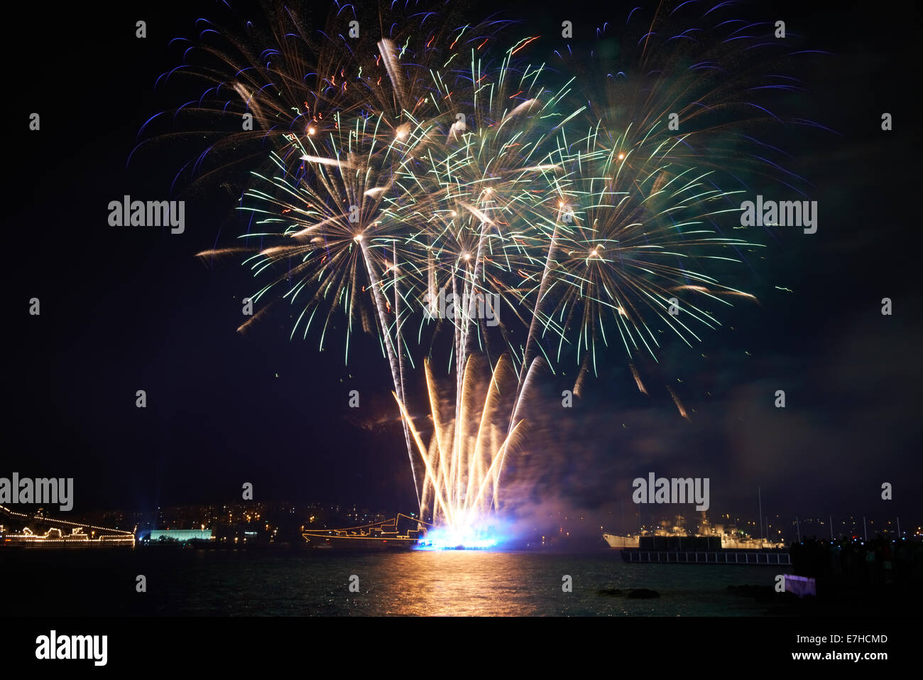 Red colorful fireworks on the black sky background Stock Photo - Alamy