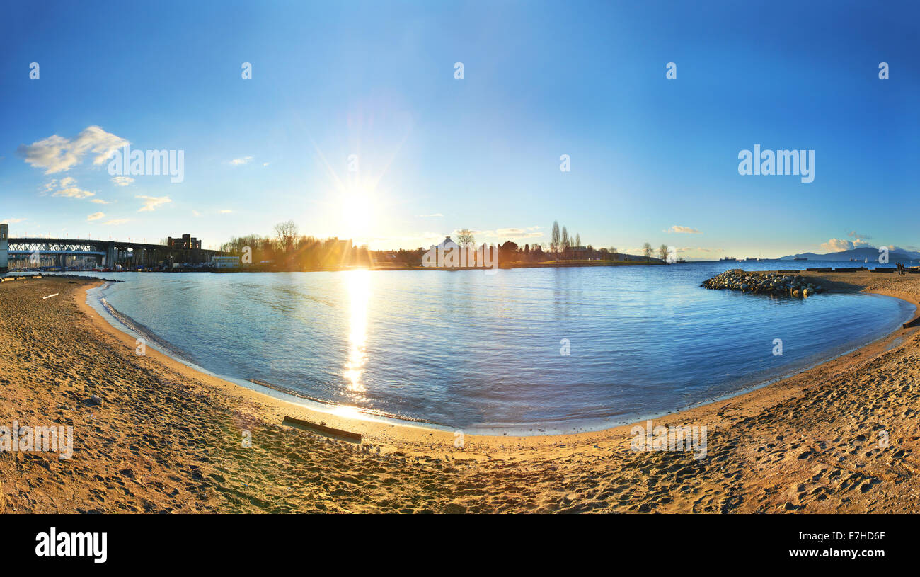 Panoramic view of Vancouver city from the sandy beach side. Sunset ...