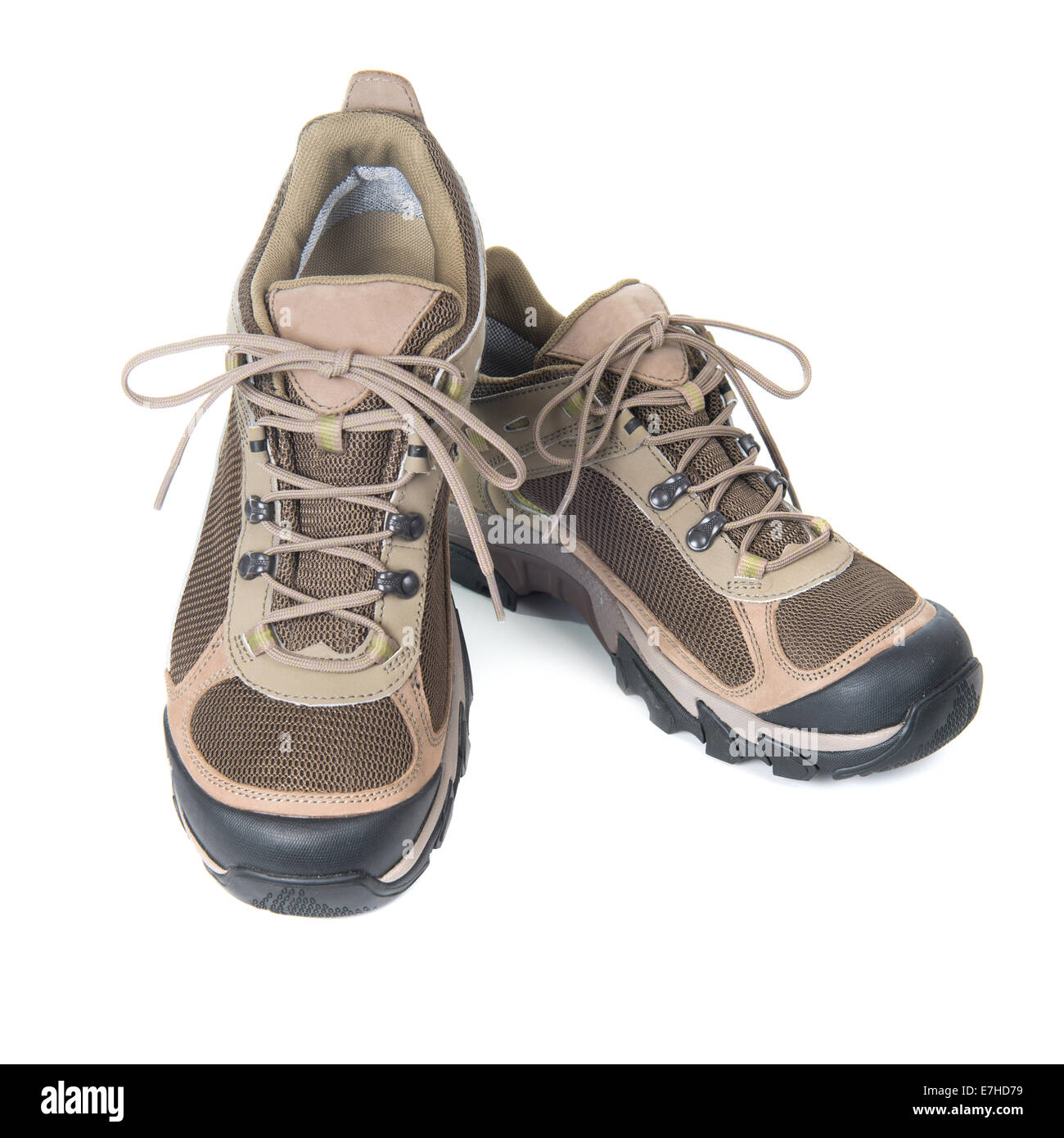 Pair of brown trainers on white isolated background Stock Photo - Alamy