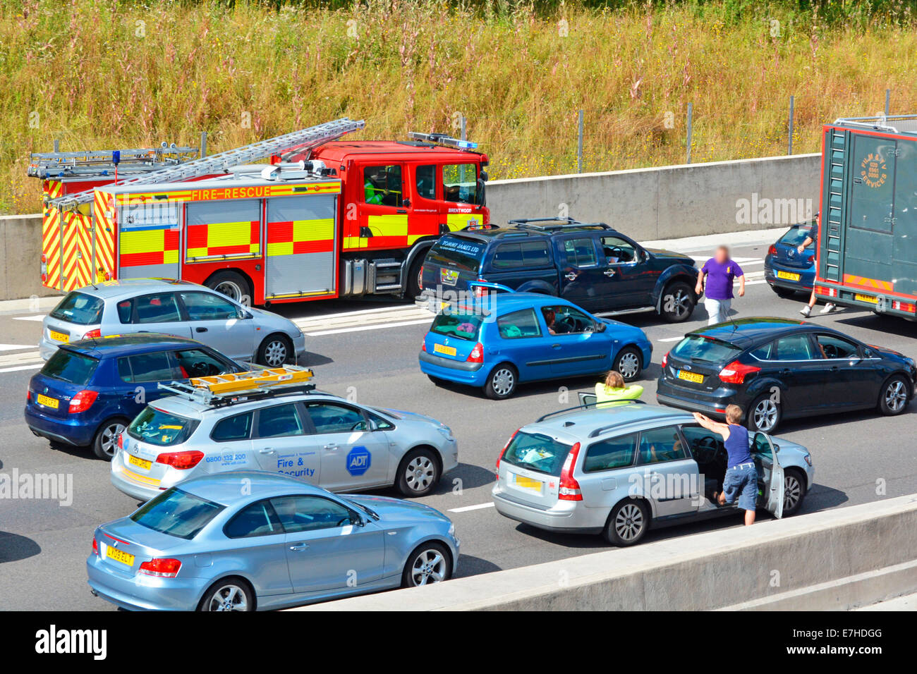 Motorists on a hot summers day in massive tailbacks on gridlocked ...