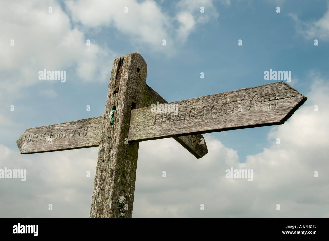 wooden signpost showing footpaths Stock Photo - Alamy