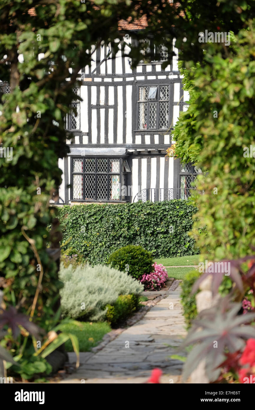 The Falcon Hotel seen through an arch in the garden of Nash's house ...