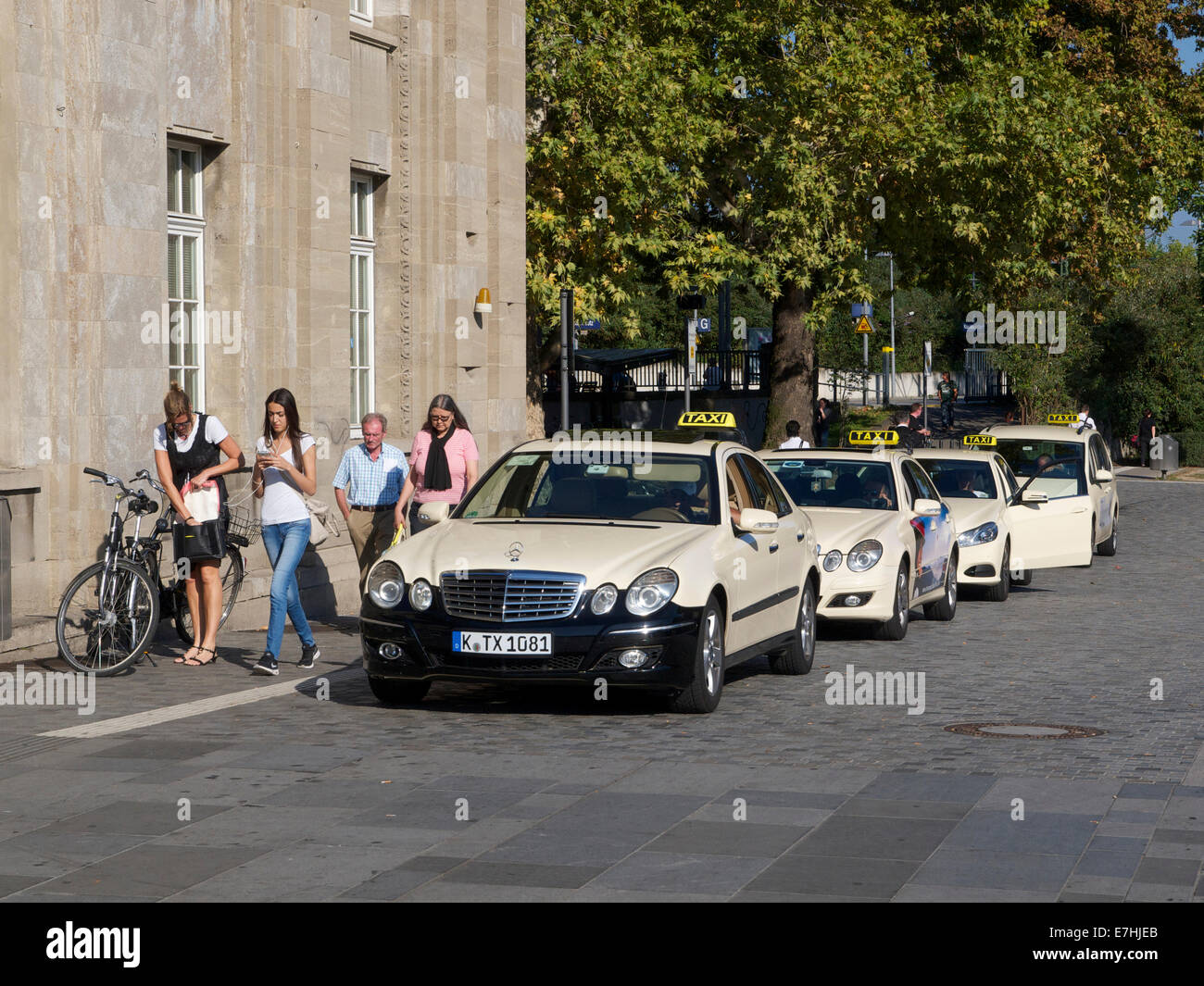 Line of official German taxis waiting at train station messe/deutz in ...