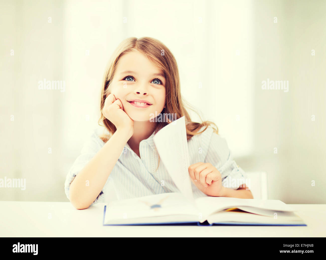 little student girl studying at school Stock Photo - Alamy