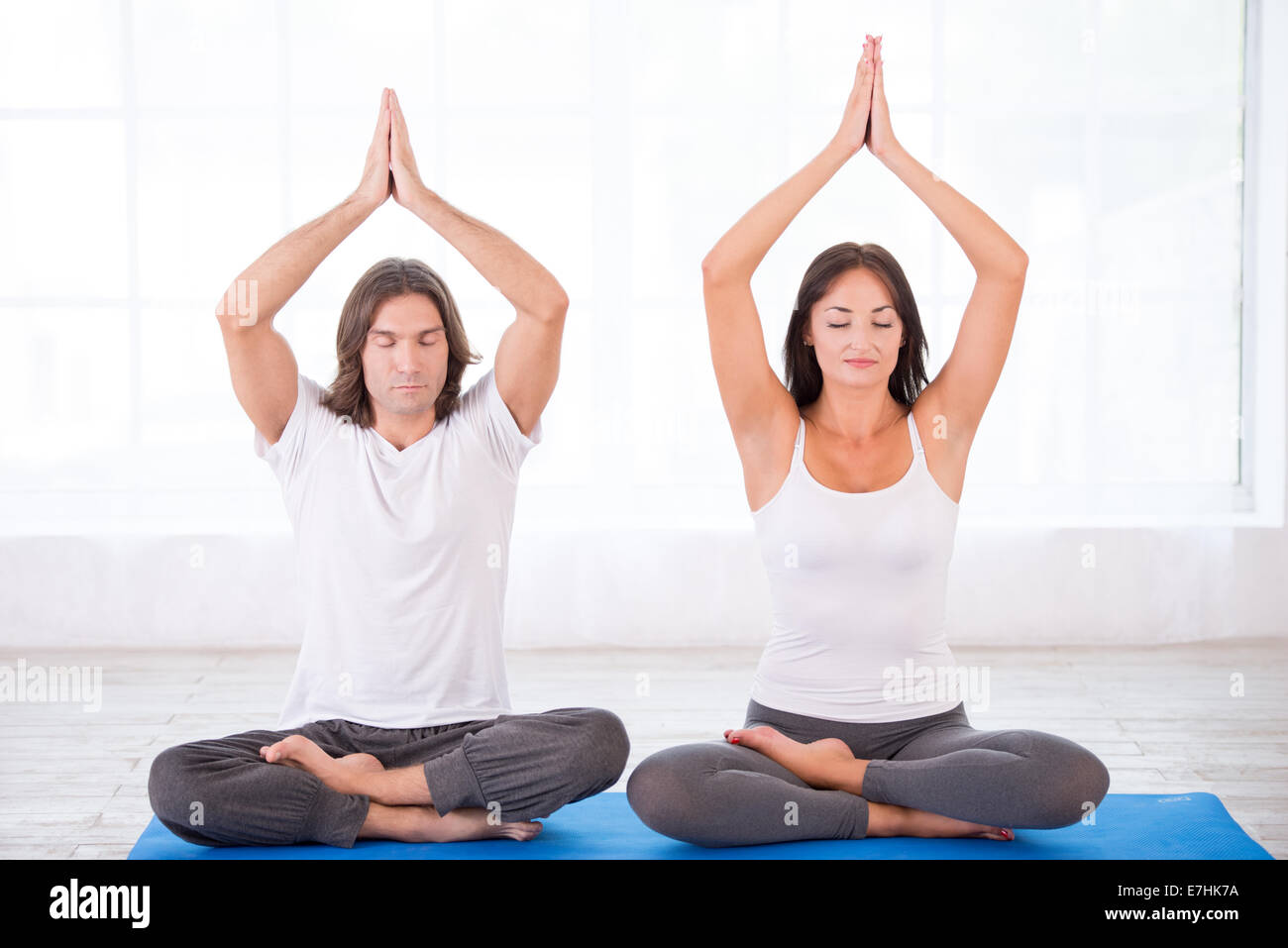 Couple in lotus position hi-res stock photography and images - Alamy