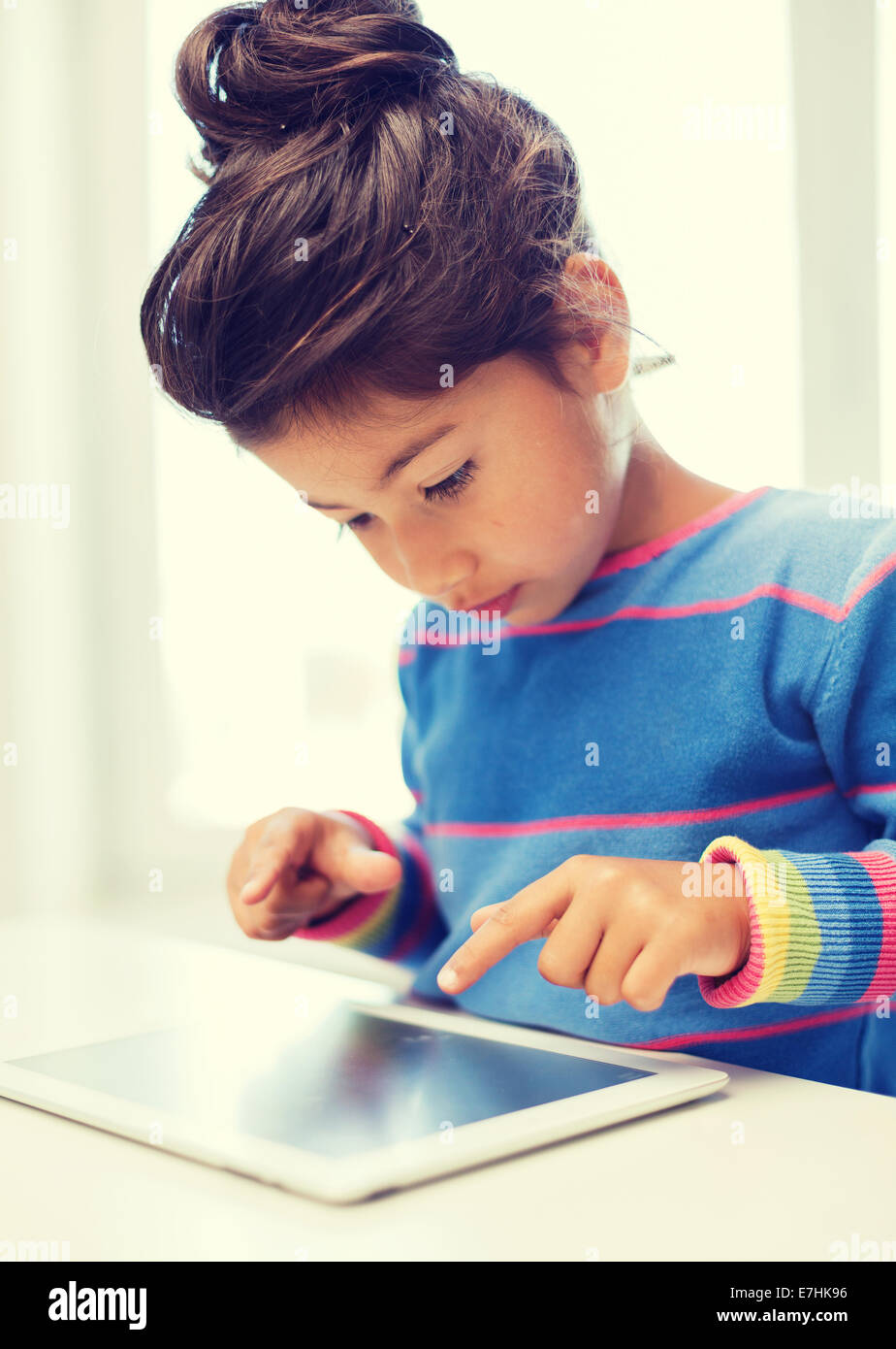 little girl with tablet pc Stock Photo - Alamy
