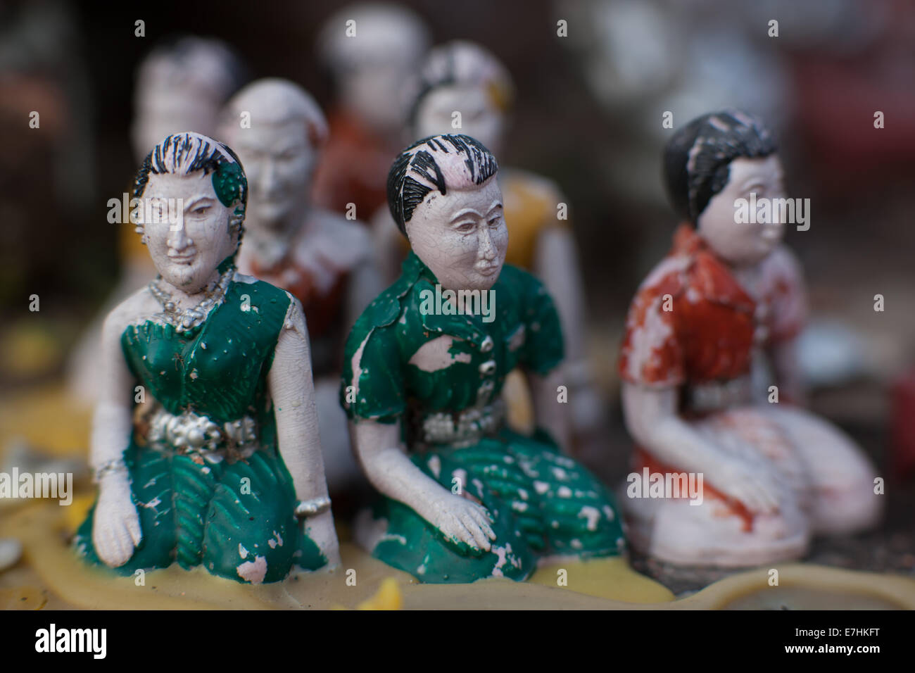 Miniature clay figures of men kneeling, Chiang Mai, Thailand Stock ...