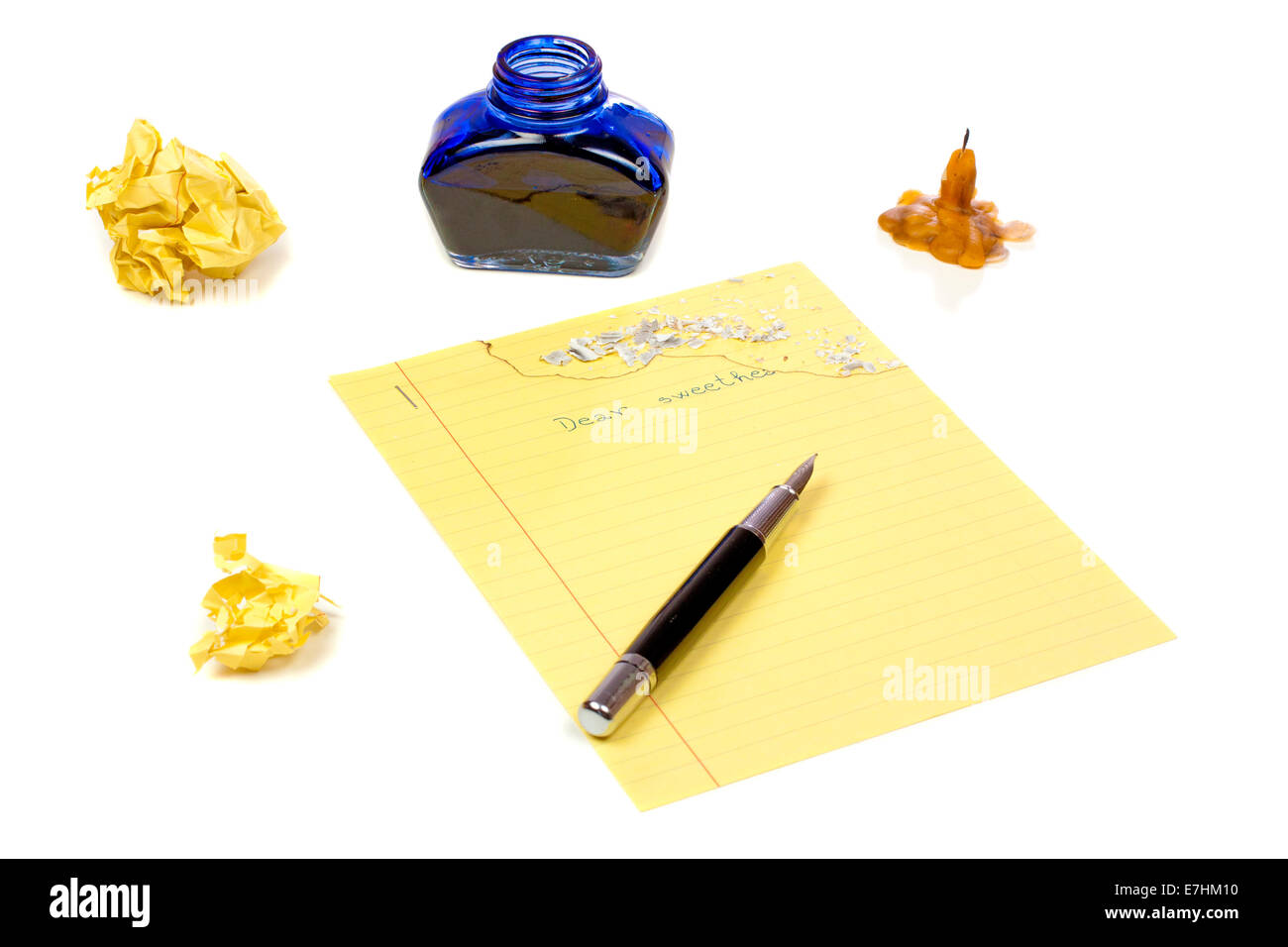 Writing letter with ink on a burnt piece of paper Stock Photo - Alamy