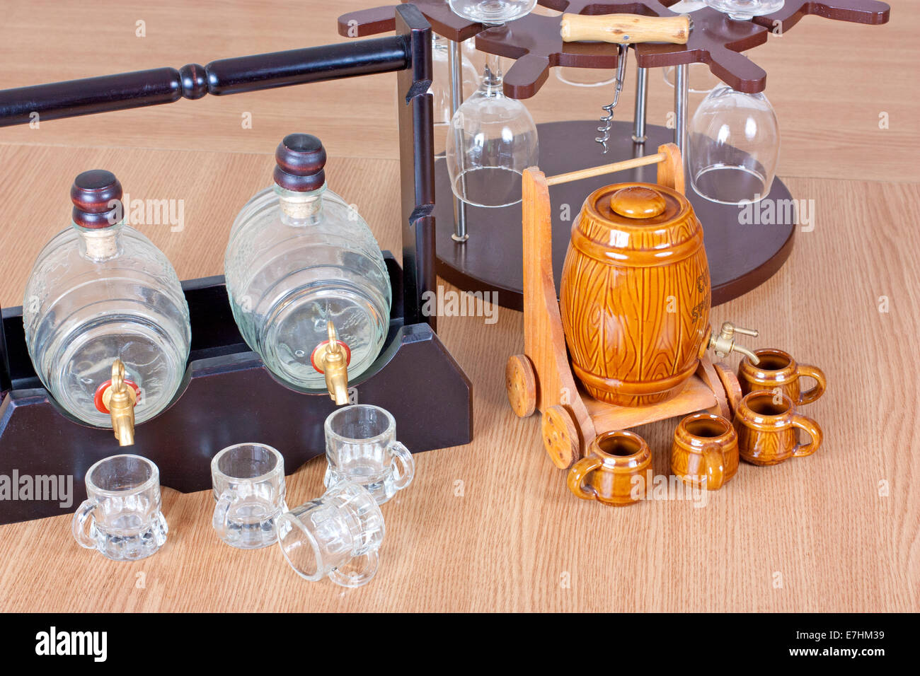 Different barrels for wine and some wine glasses Stock Photo - Alamy