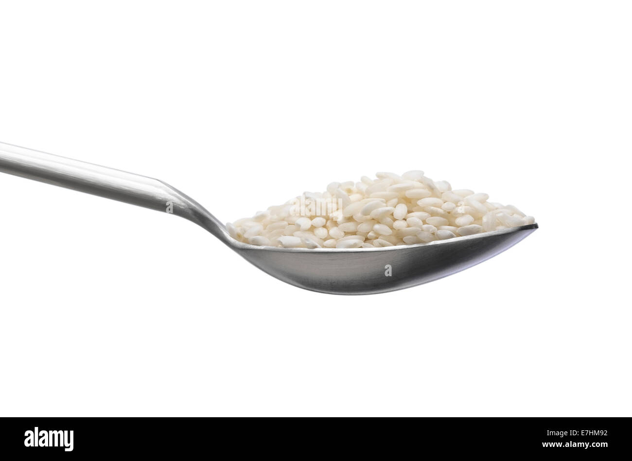 Aborio Rice isolated on a Spoon Stock Photo - Alamy
