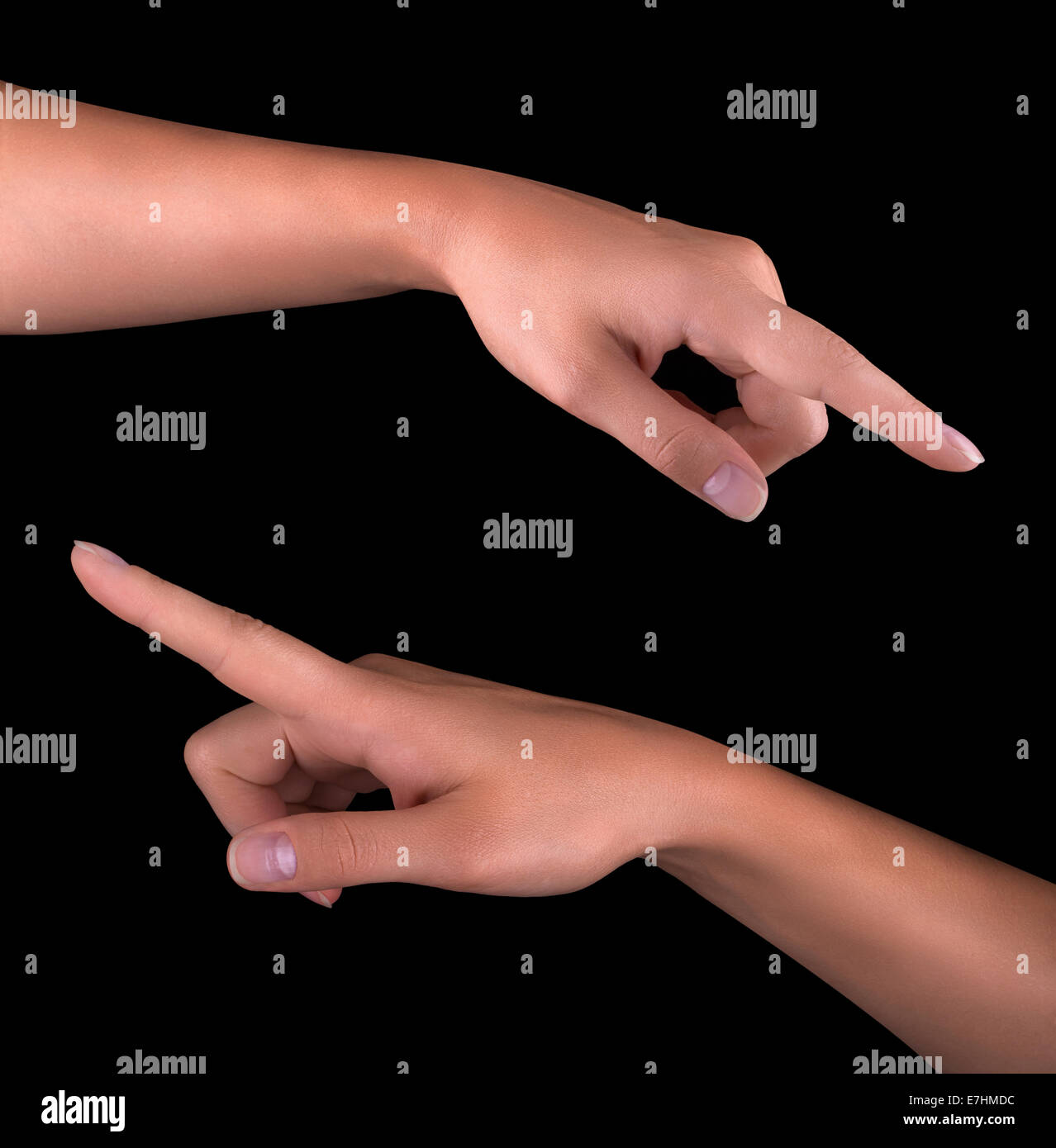 image of a woman's finger pointing or touching isolated on black ...