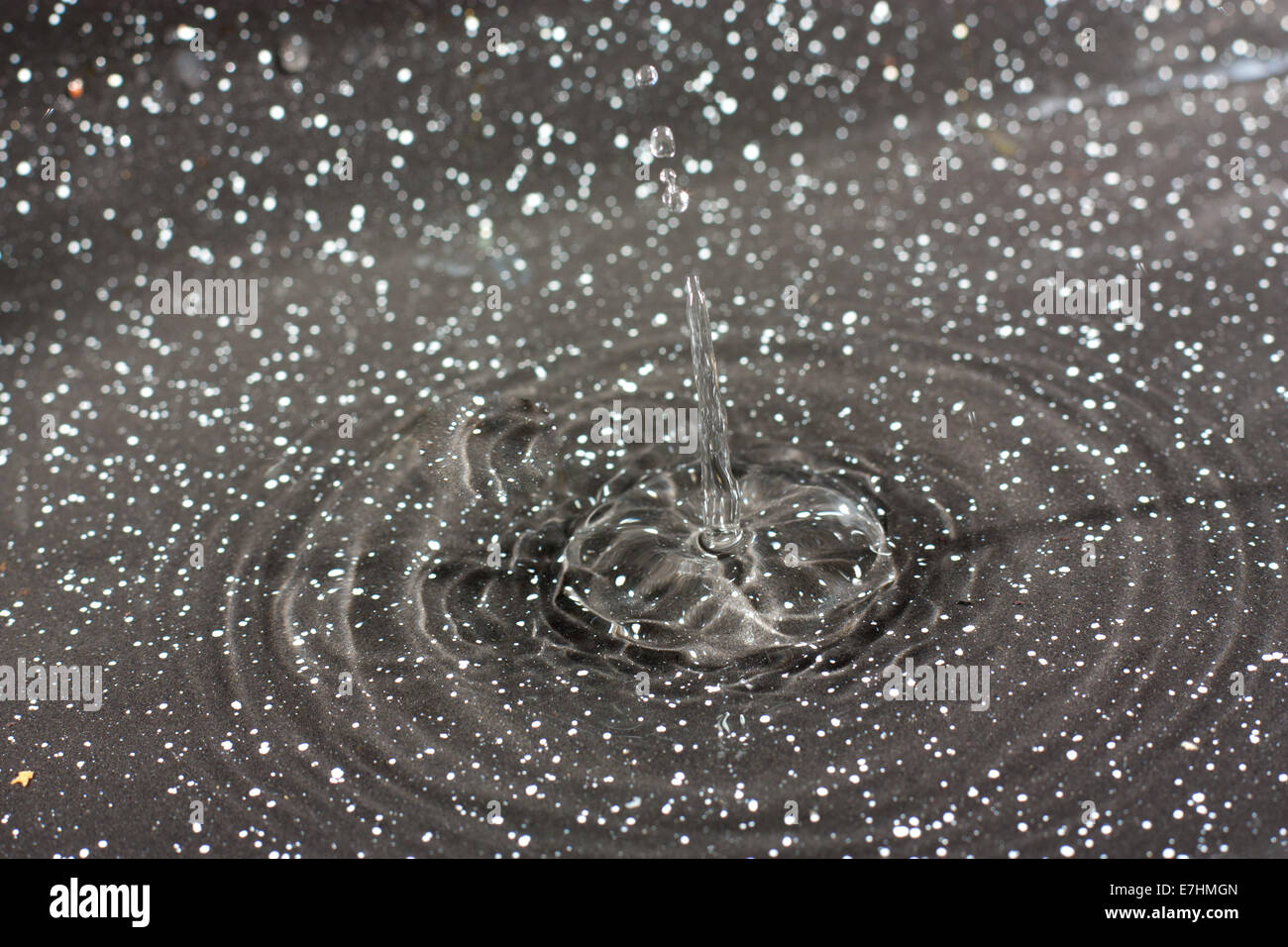 Water drop as black color background Stock Photo - Alamy