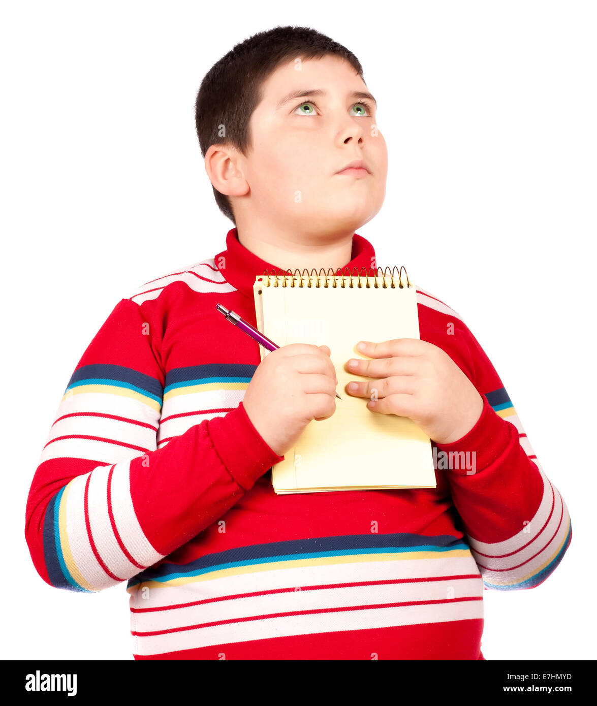 Boy thinking with notepad isolated over white background Stock Photo ...