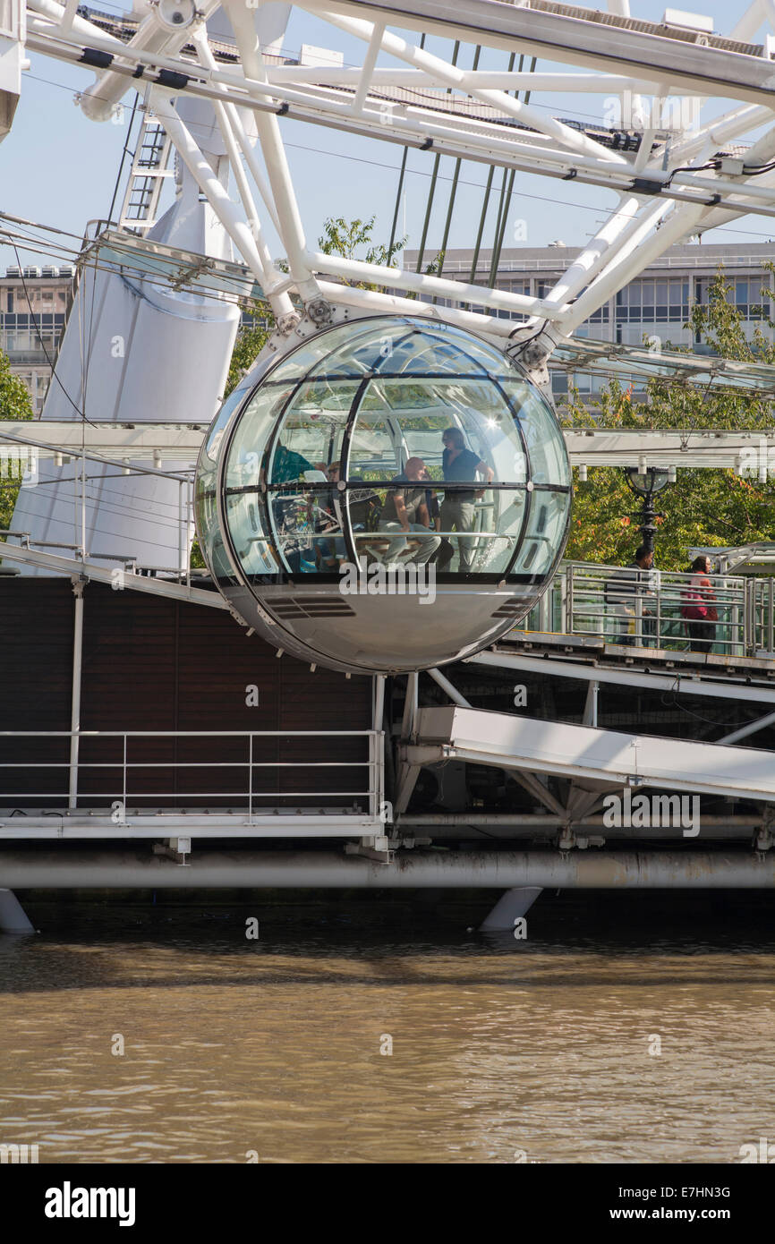 people in pod on London Eye above the River Thames in London UK in ...