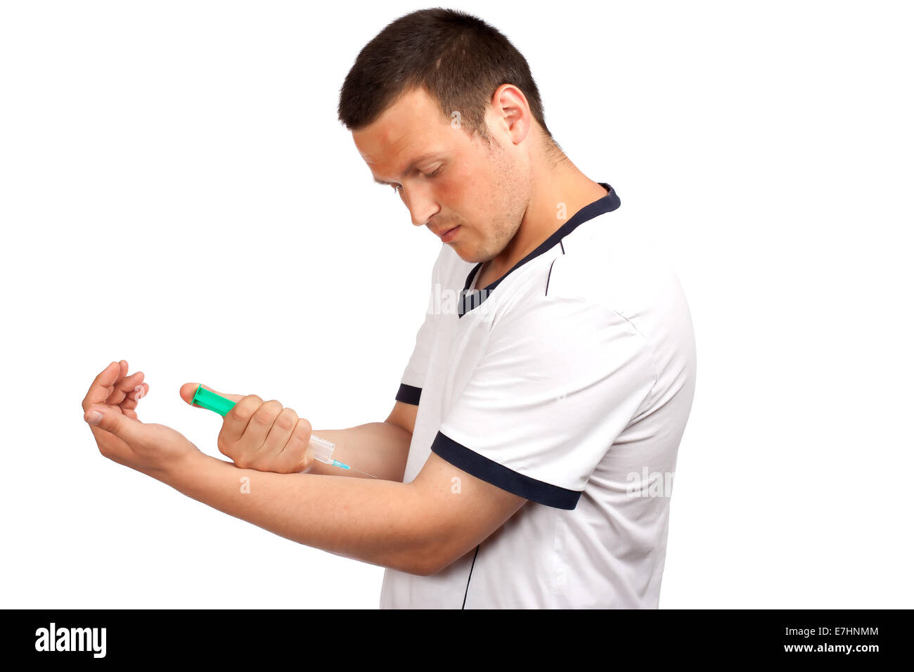 drug addict man with syringe in action, isolated over white background ...