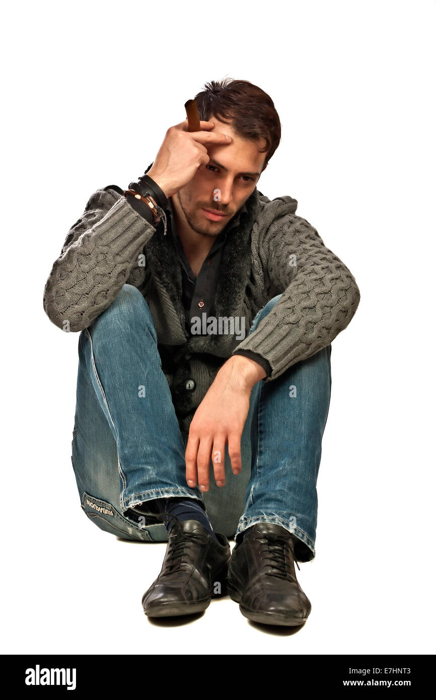 Man sitting down and thinking, isolated on white background Stock Photo ...