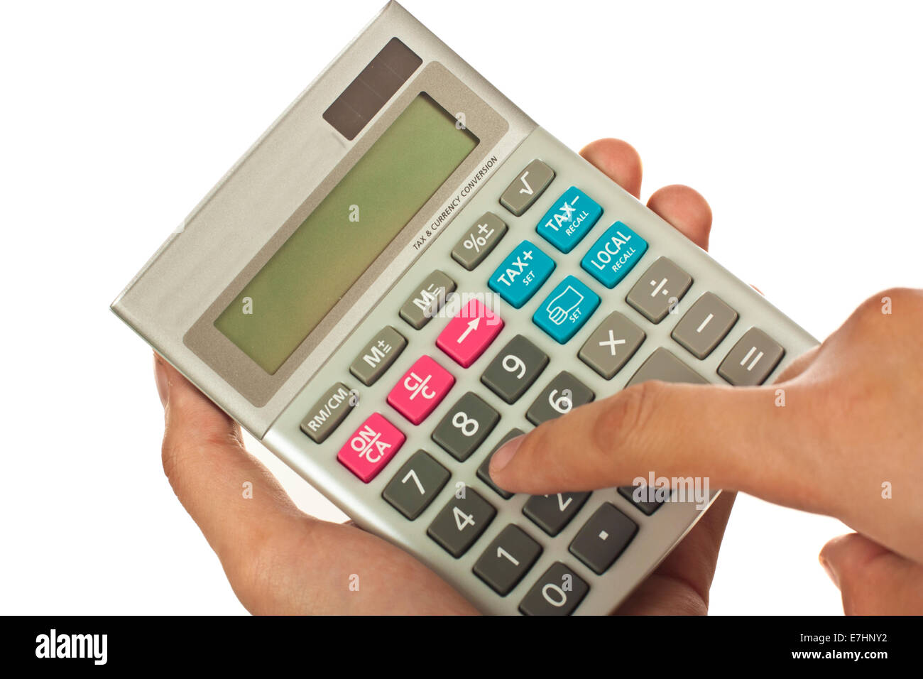 Hand, holding calculator isolated on white background Stock Photo - Alamy