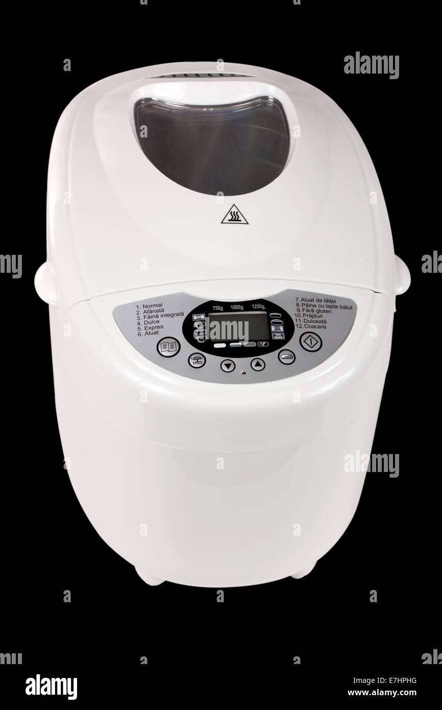 electric bread maker isolated on a black background Stock Photo - Alamy